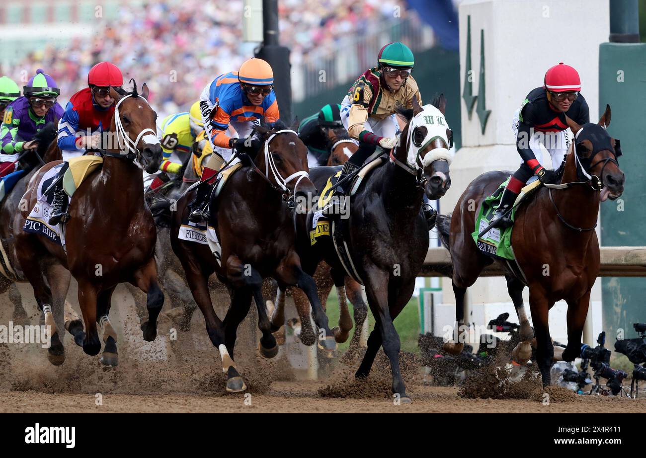 Louisville, United States. 04th May, 2024. Horses and jockeys charge ...