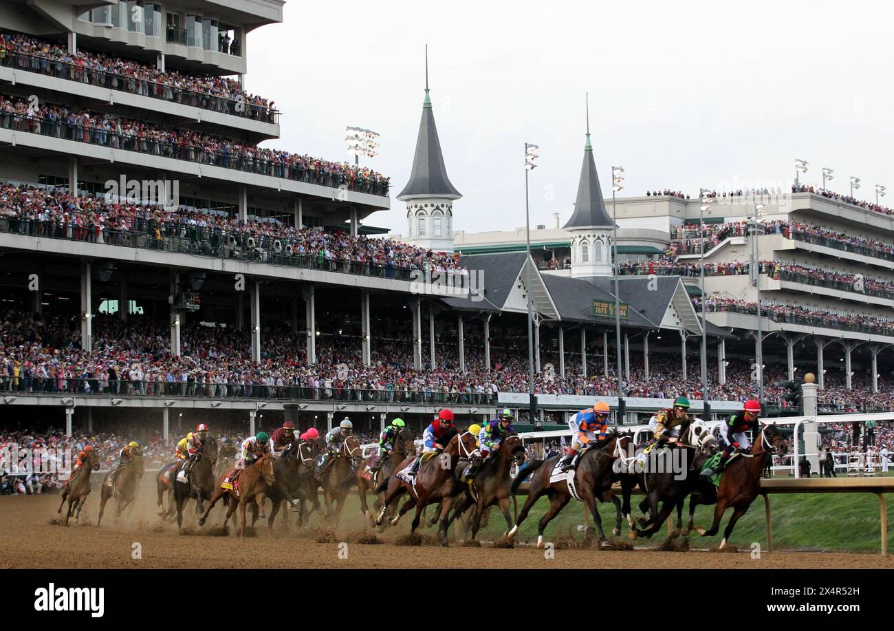 Louisville, United States. 04th May, 2024. Horses and jockeys round the ...