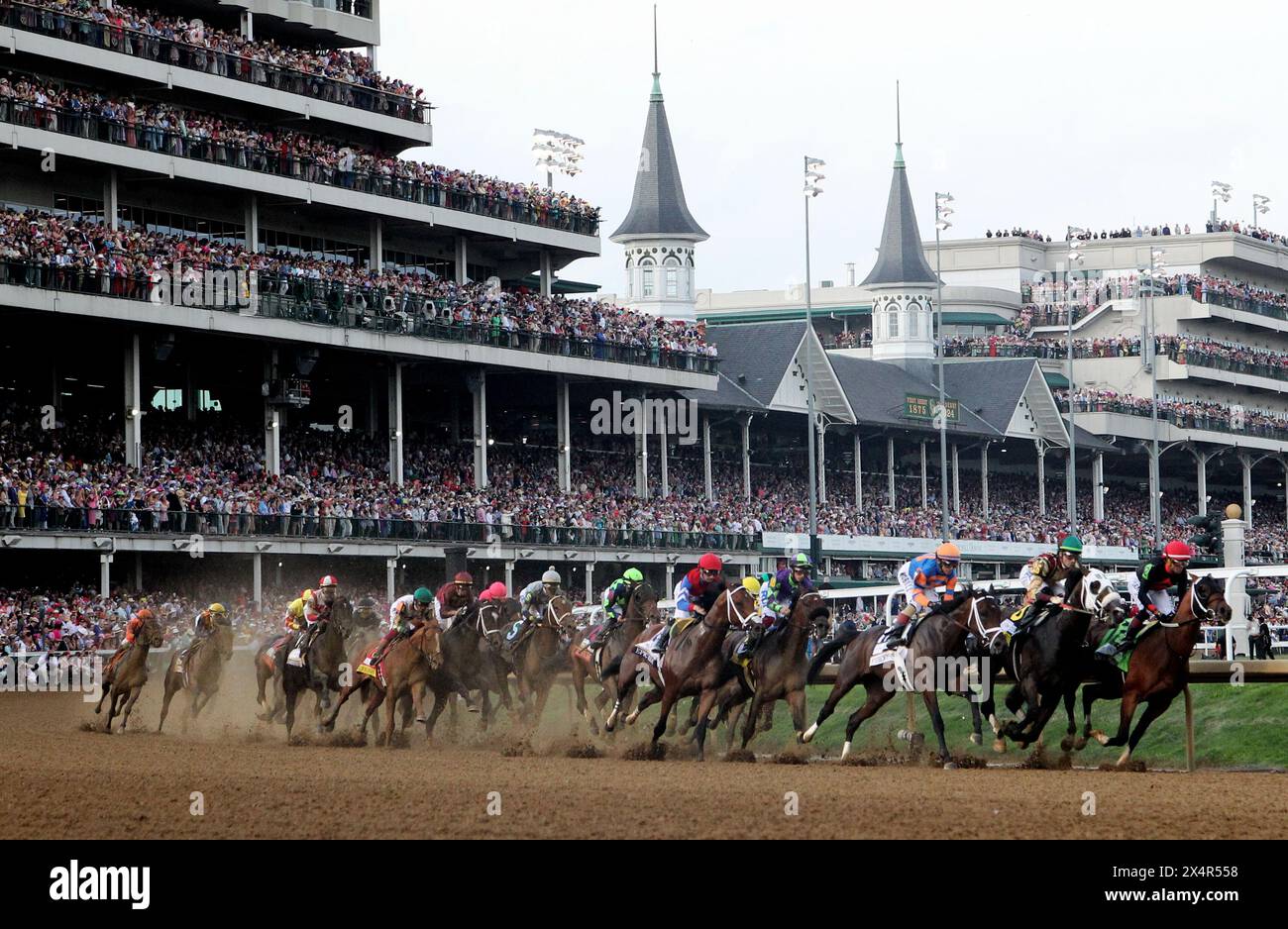 Louisville, United States. 04th May, 2024. Horses and jockeys round the ...