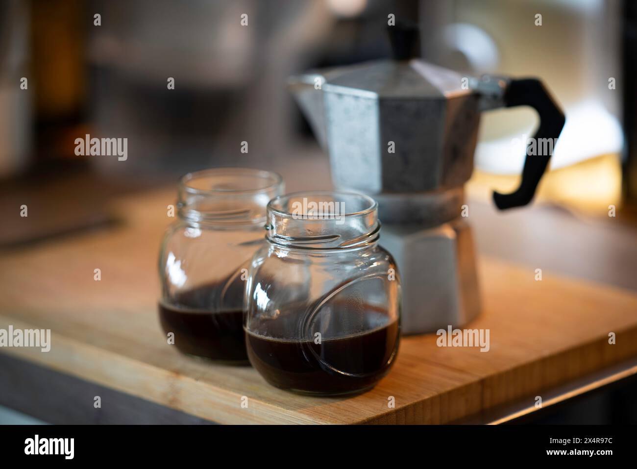 Making a white coffee with an Italian mocha Stock Photo - Alamy
