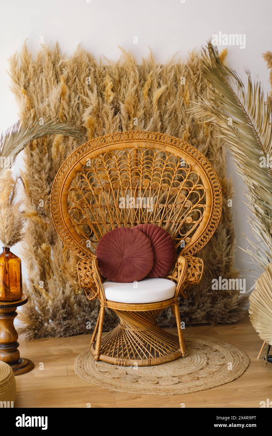 Rustic Bohemian Interior Design With Rattan Peacock Chair and Pampas ...