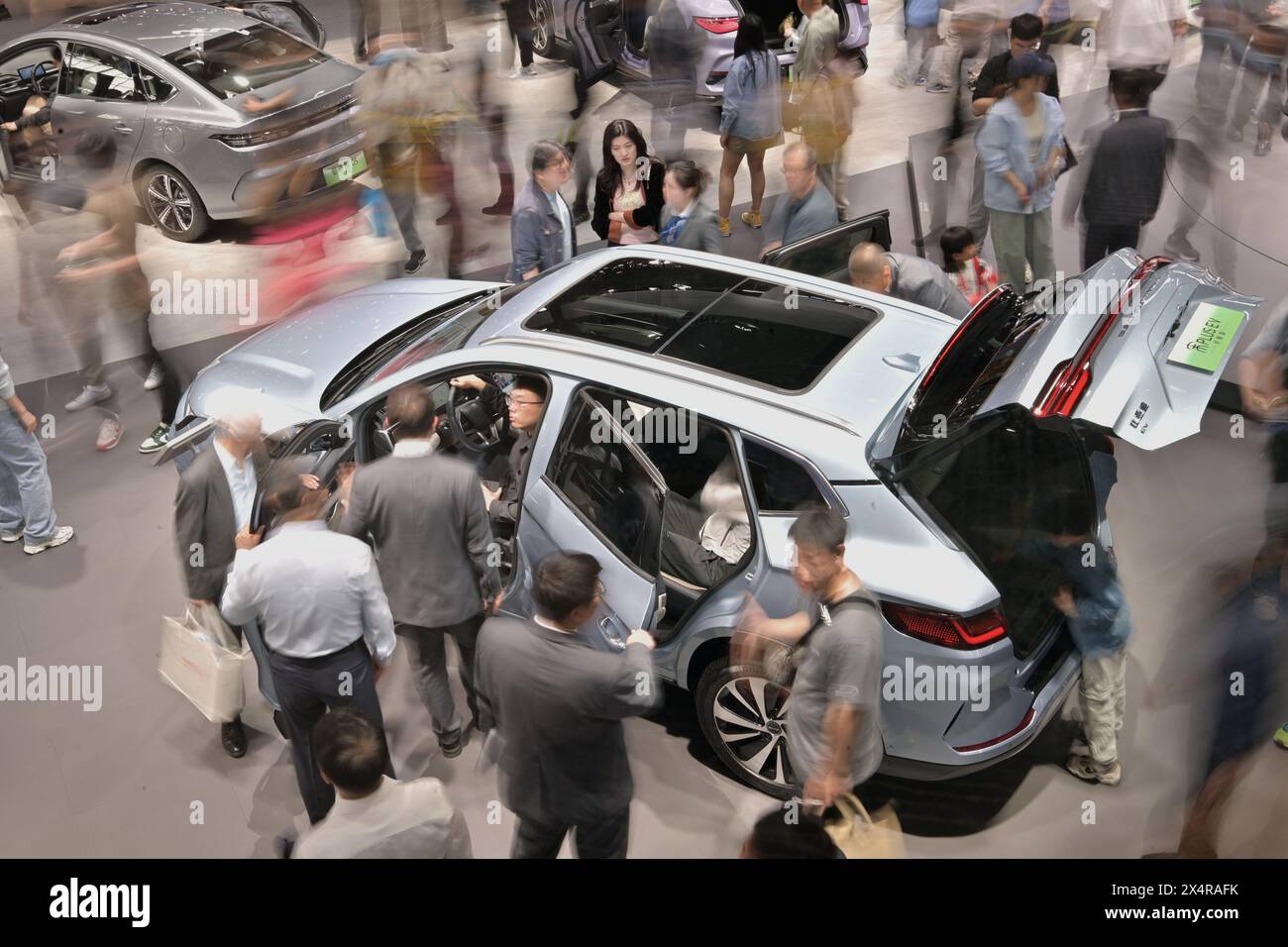 Beijing, China. 4th May, 2024. Visitors view a vehicle of Song PLUS by ...