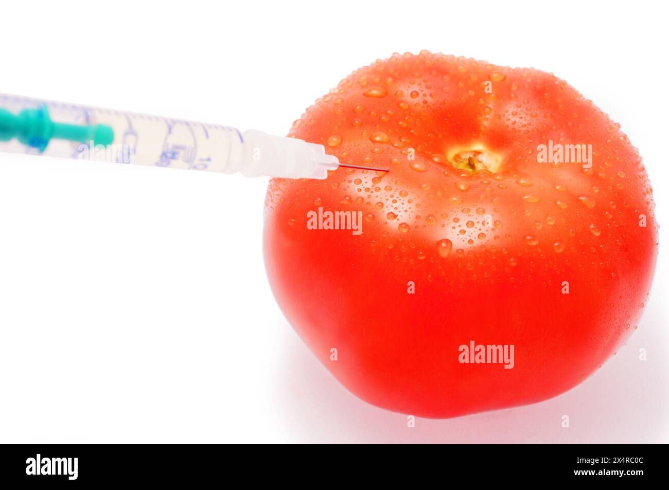 injection in tomato, isolated on white Stock Photo - Alamy