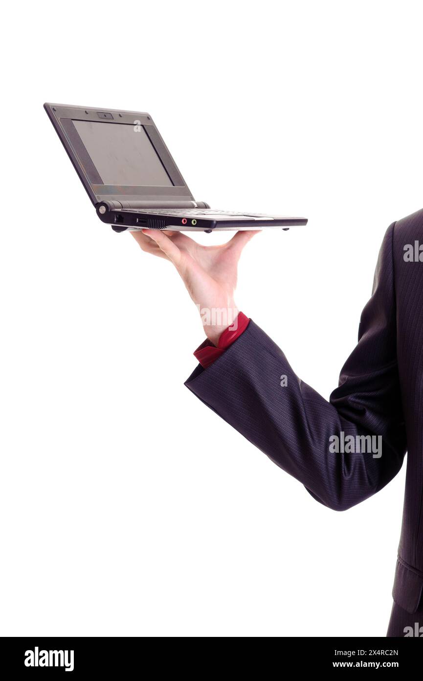 businessman hold black netbook on arm like waiter, isolated on white ...