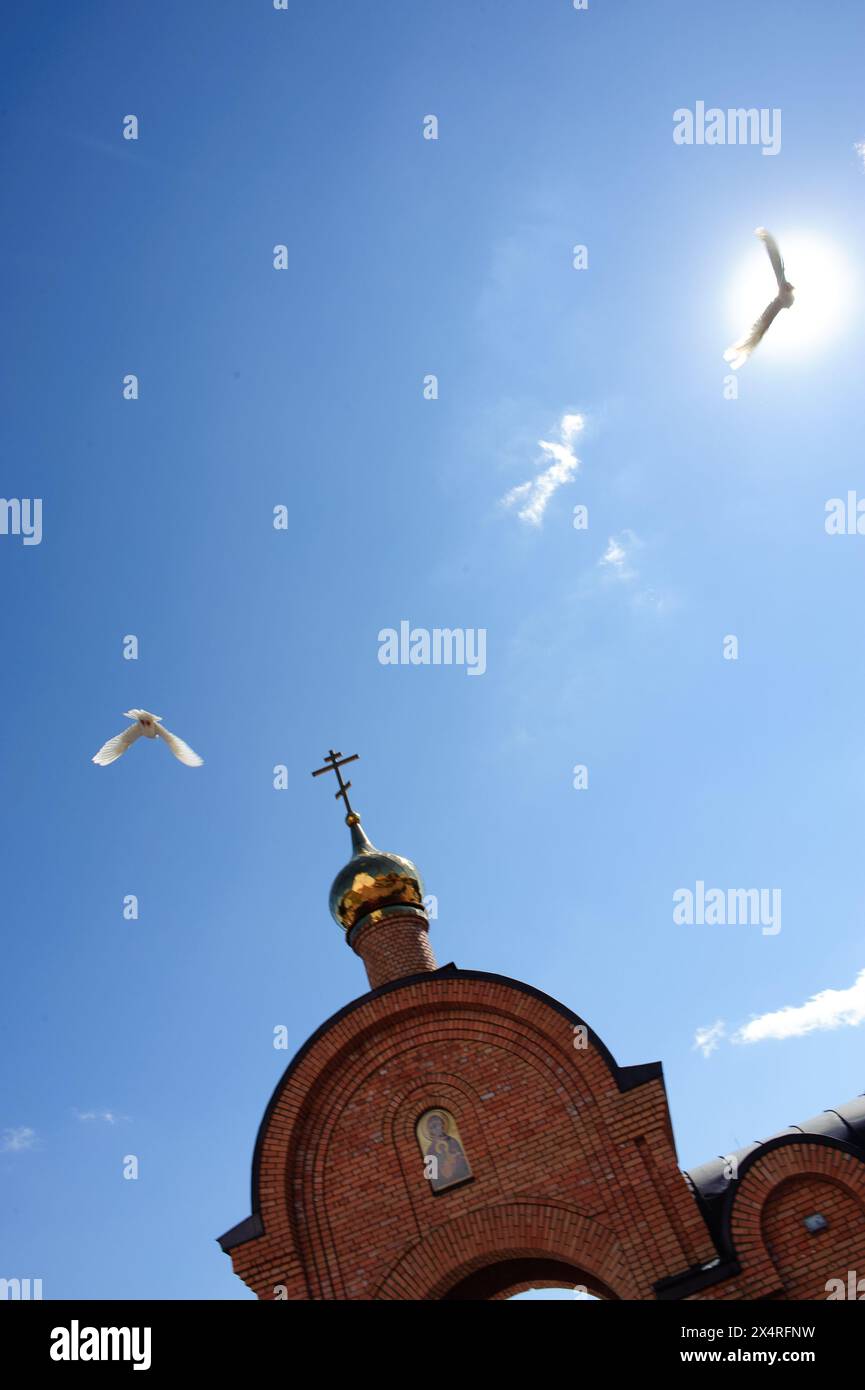 Flying over white church hi-res stock photography and images - Alamy