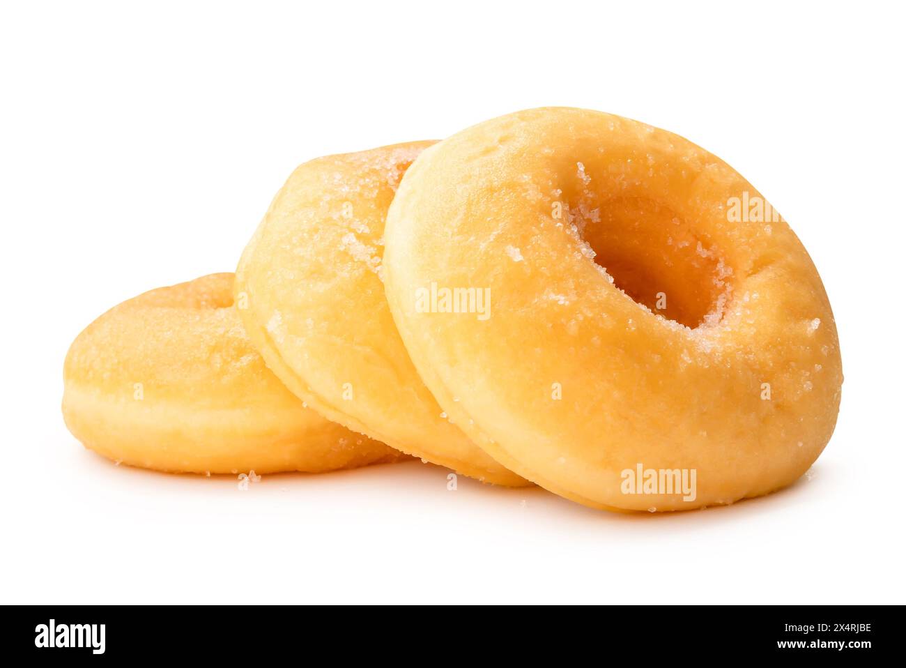 Side view of golden cinnamon donuts in stack is isolated on white ...