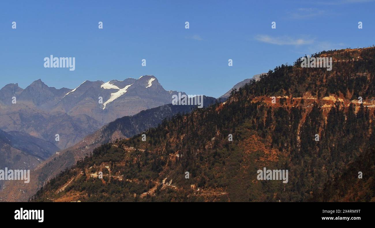 snowcapped himalaya mountains and remote countryside area of tawang ...