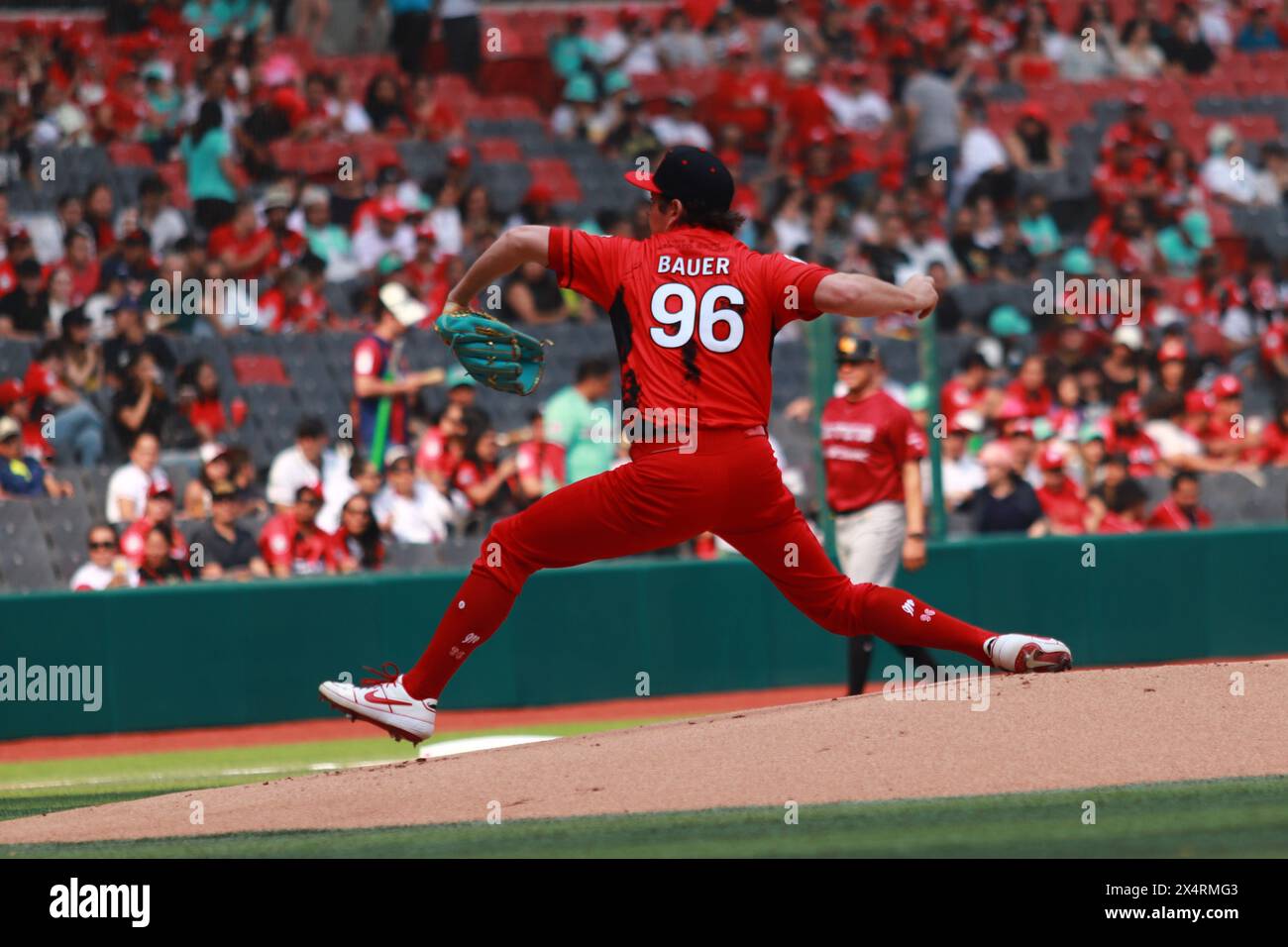 Trevor Bauer #96 of Diablos Rojos pitches the ball during the match 2 ...