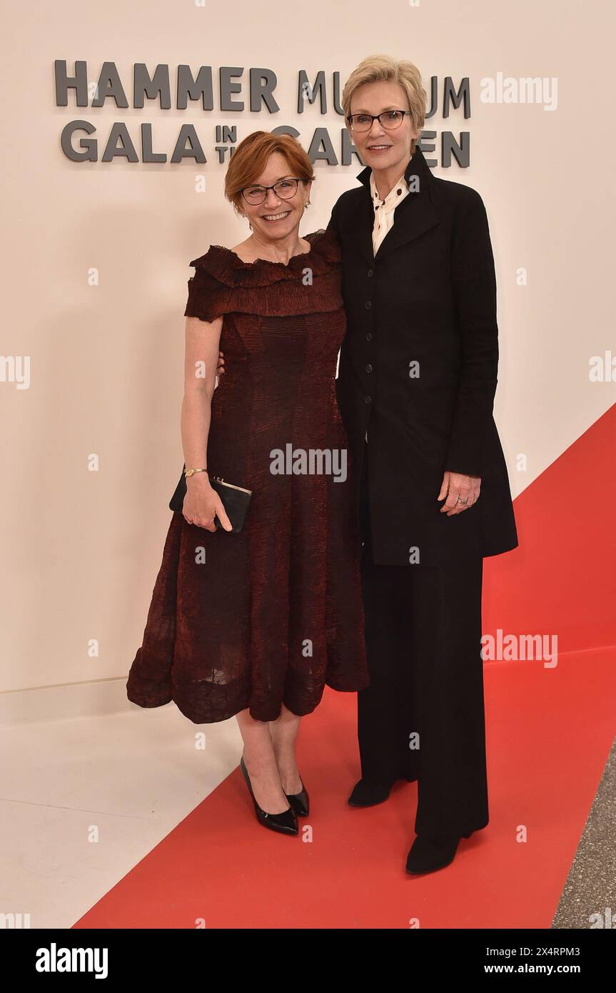 Jennifer Cheyne, left, and Jane Lynch arrive at the 19th Hammer Museum ...