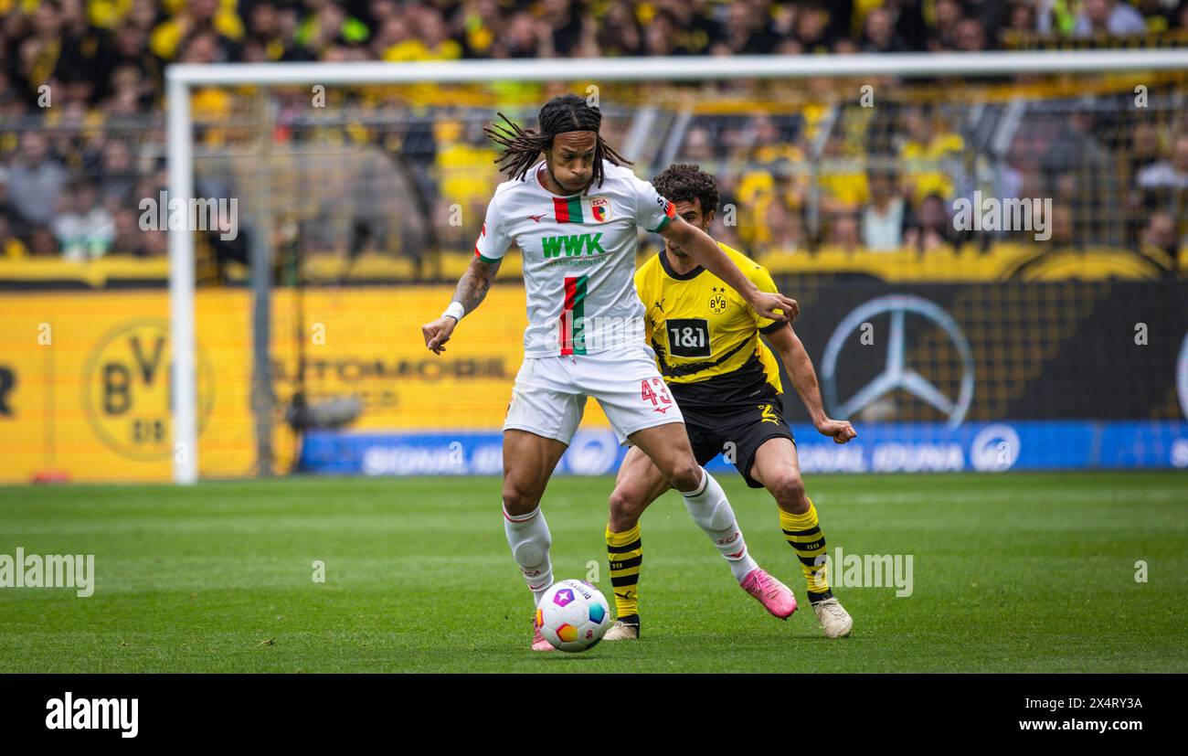 Dortmund, Germany. 4th Mai 2024. Kevin Mbabu (FCA) Mateu Morey (BVB ...