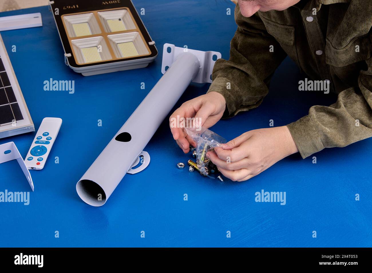 Installing holder for solar panel and LED street lamp, assembler ...