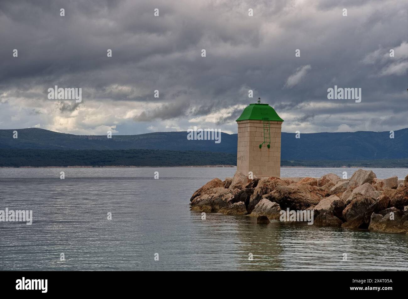 Lighthouse on the rock in Adriatic sea Stock Photo - Alamy