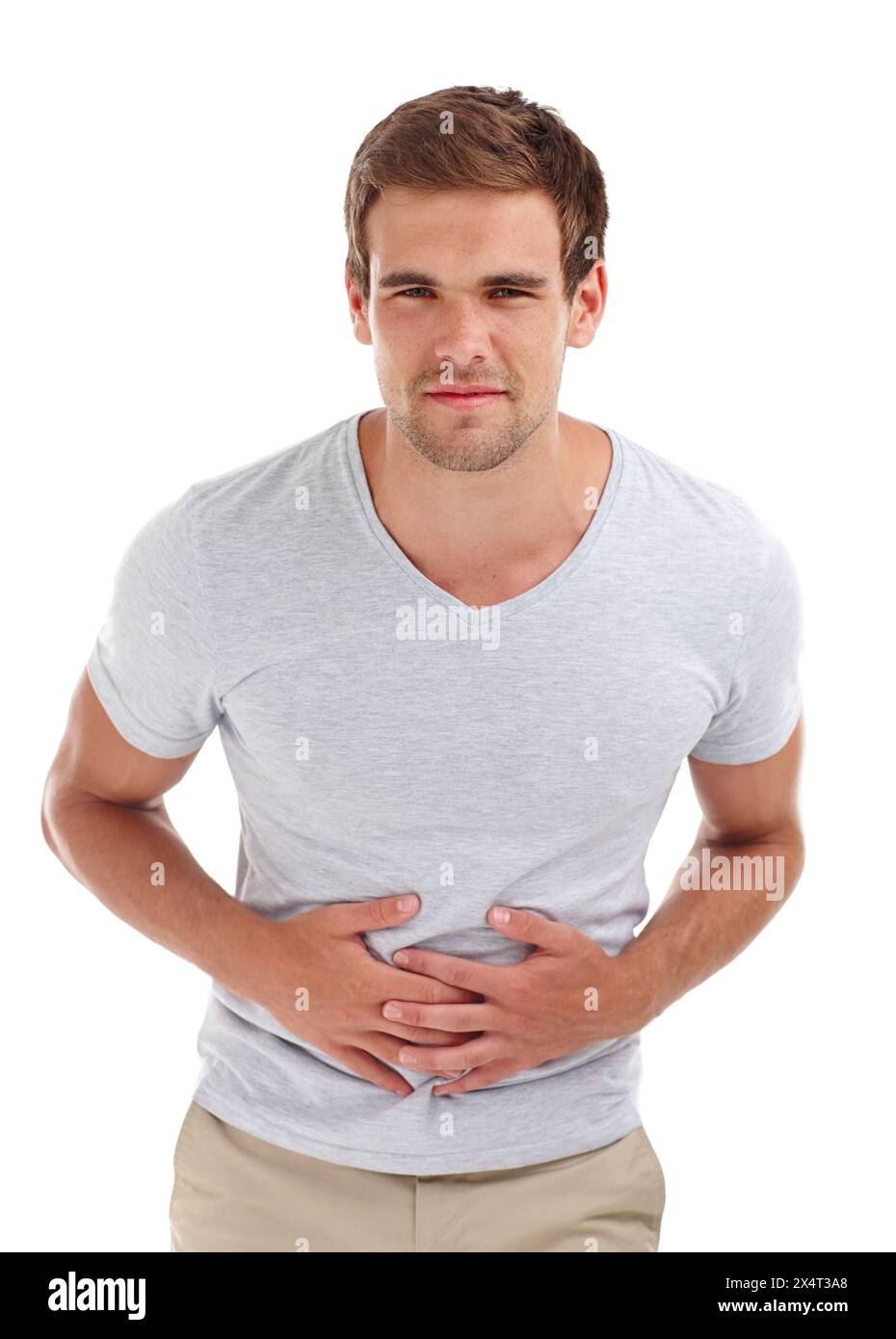 Stomach ache, pain and portrait of man on a white background with ...