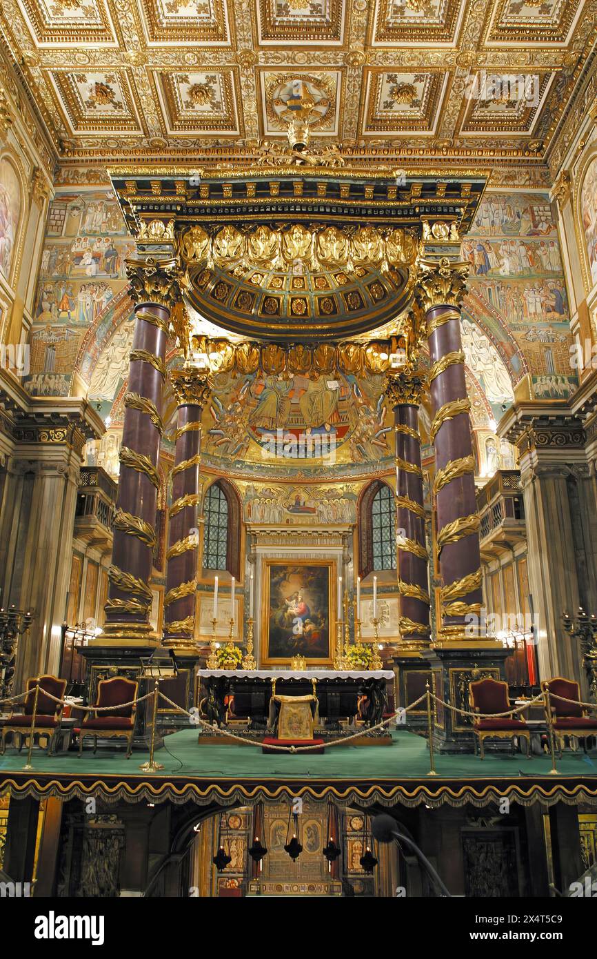Altar with baldachin and the apse with triumphal arch and mosaic cycle ...