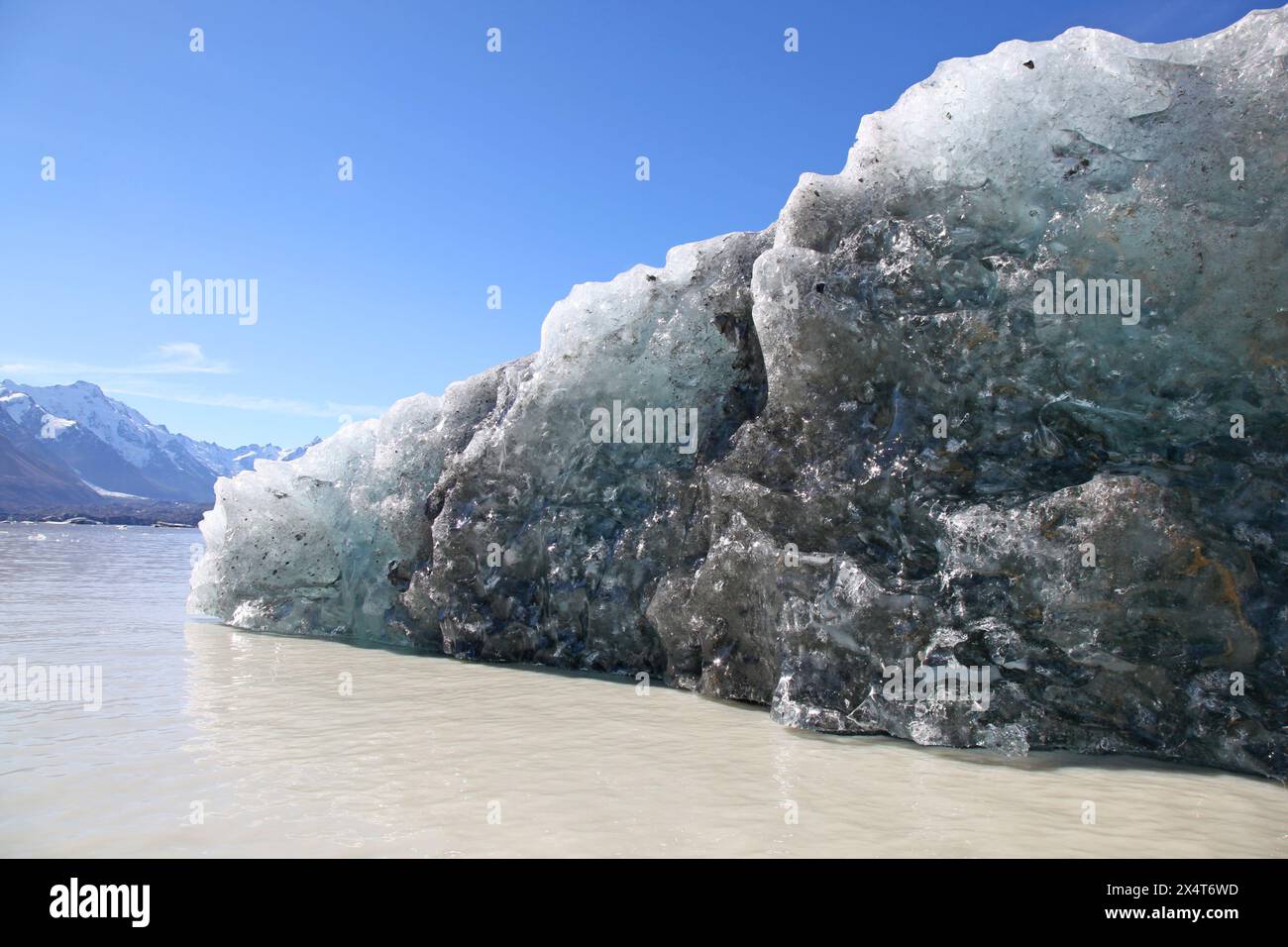 An iceberg in Tasman Lake at the terminal of the massive Tasman Glacier ...