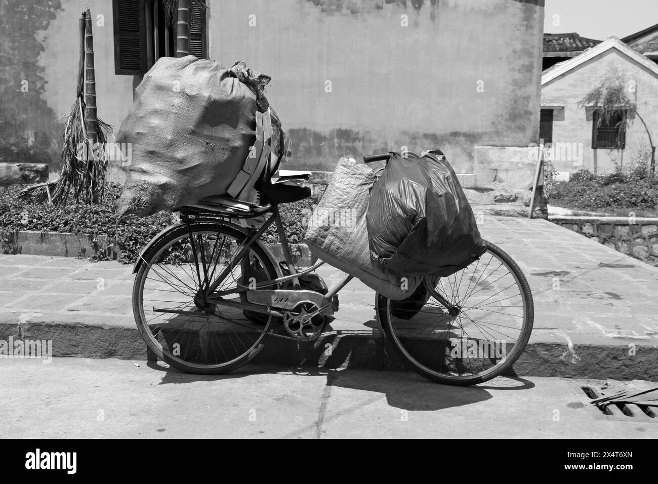 A bicycle used to collect recycling materials in Hoi An - Vietnam Stock ...