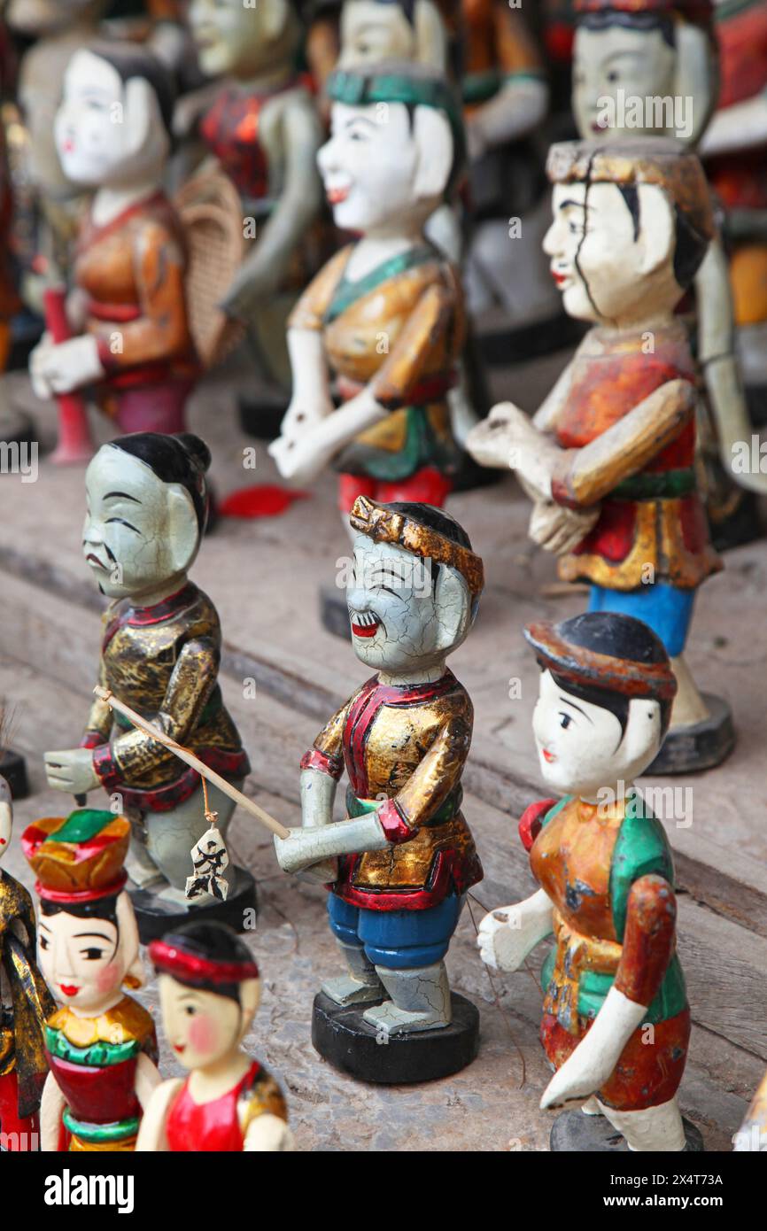 Painted wood carving of Vietnamese characters in Hanoi Vietnam Stock ...