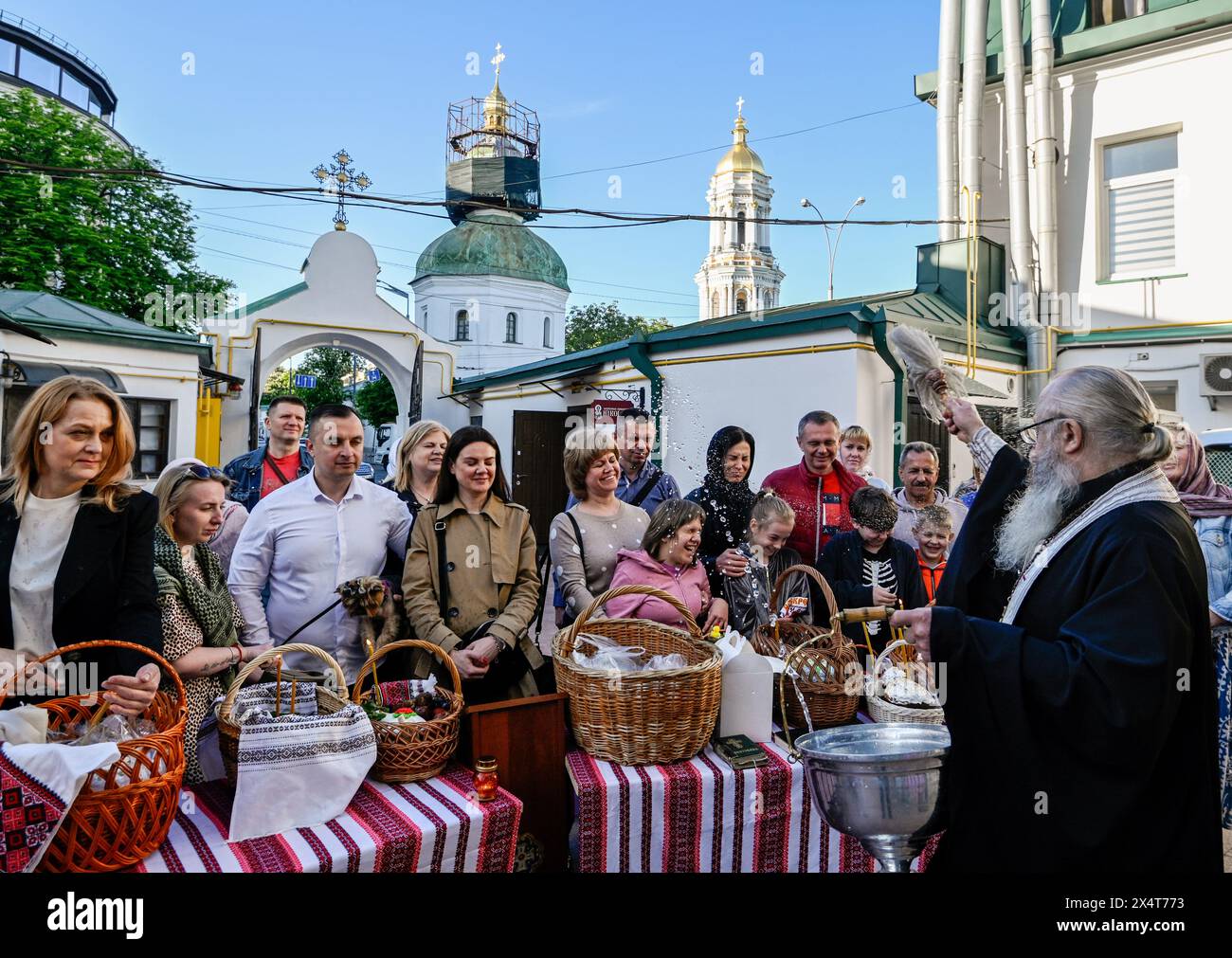 Kyiv, Ukraine. 04th May, 2024. An Orthodox priest seen blessing the traditional Easter cakes and ...