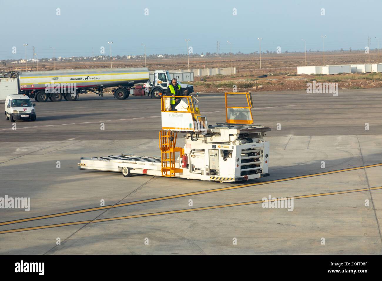 Djerba, Tunesia - April 27, 2024: aircraft loader or pallett truck at ...