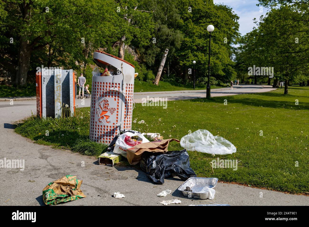 Gothenburg, Sweden - June 5 2021: Litter bin overflowing with trash ...