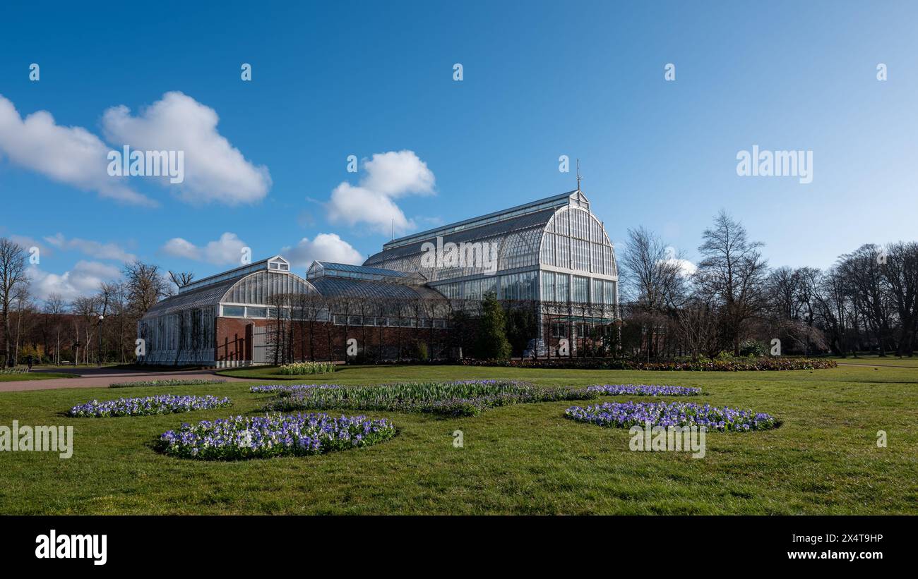 Glass palm house in public park in Gothenburg, Sweden with flower ...