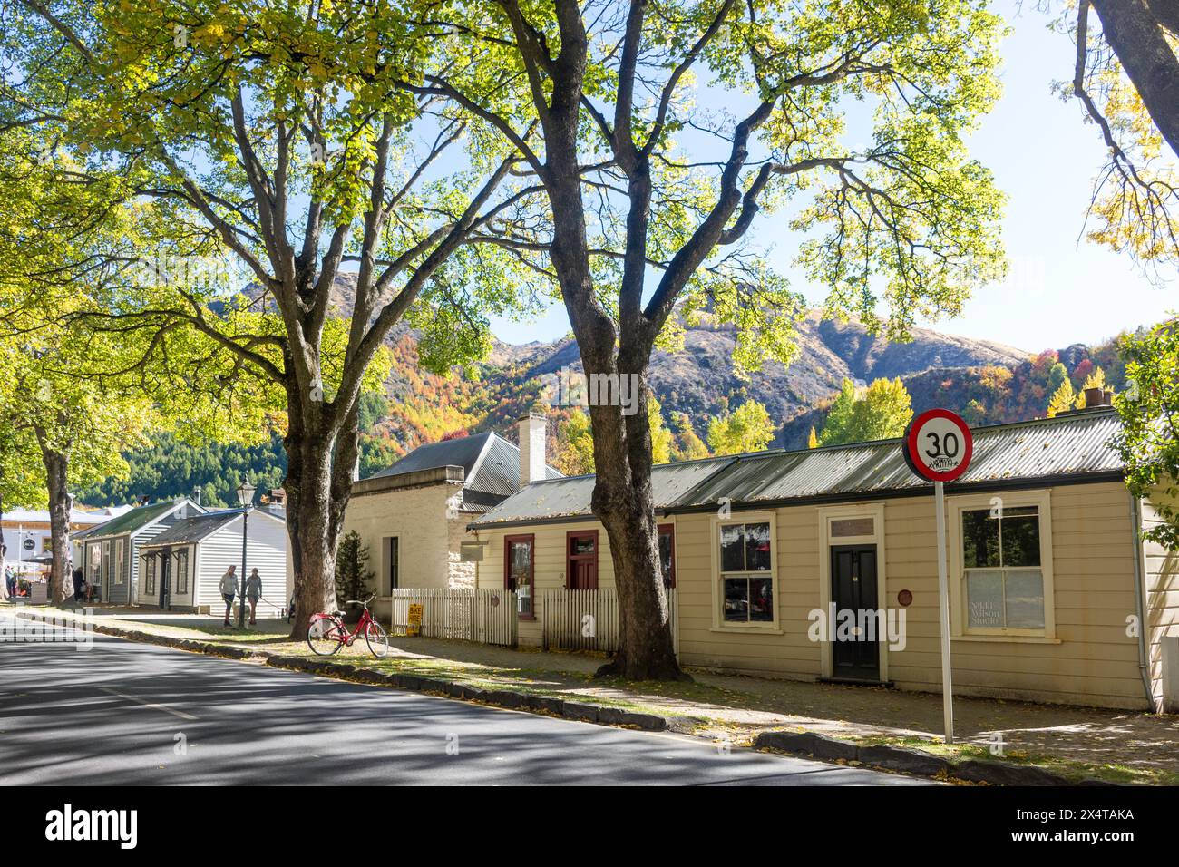 Colonial cottages in autumn colours, Buckingham Street, Arrowtown ...
