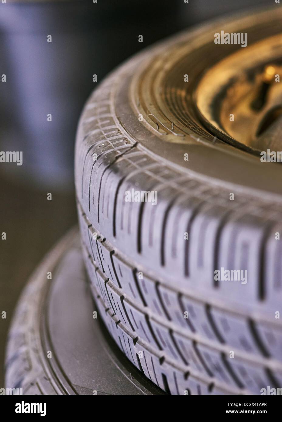 Tyres, stack and wheel in garage for repair, rubber and fixing or ...