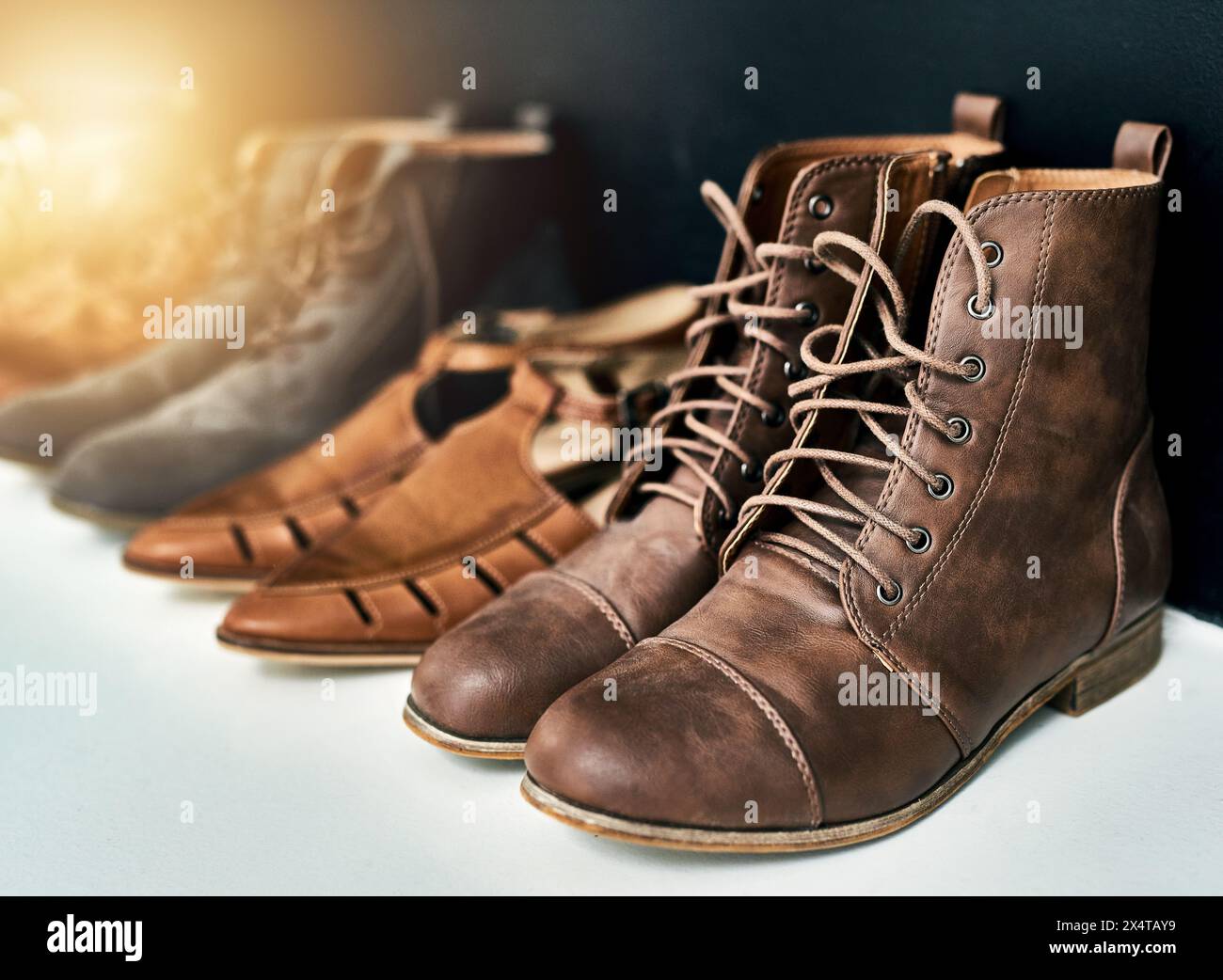 Shoes, pair and leather boots for fashion, choice and cool style or ...