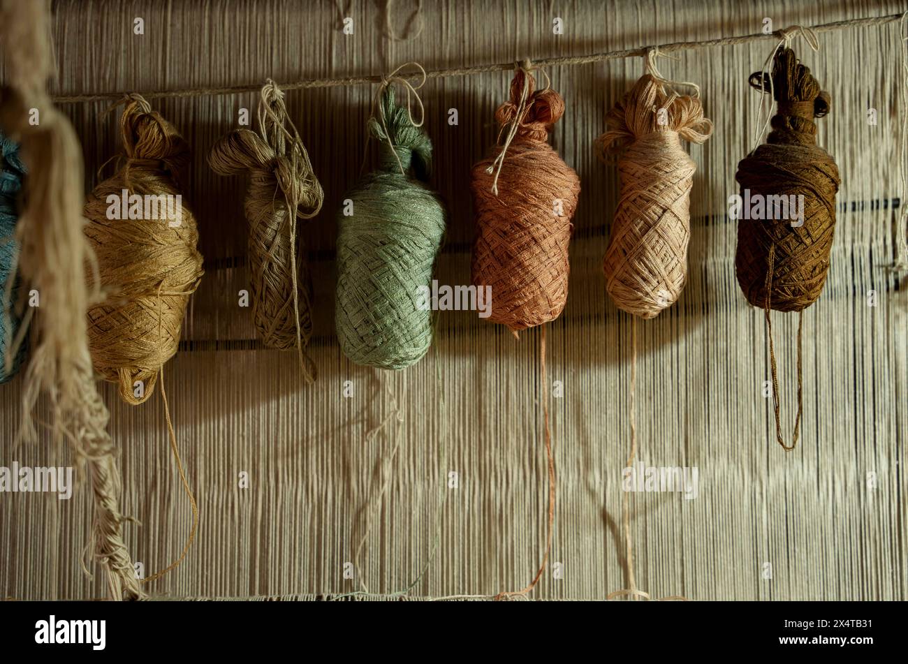 General view of threads being used in traditional carpets factory. The ...