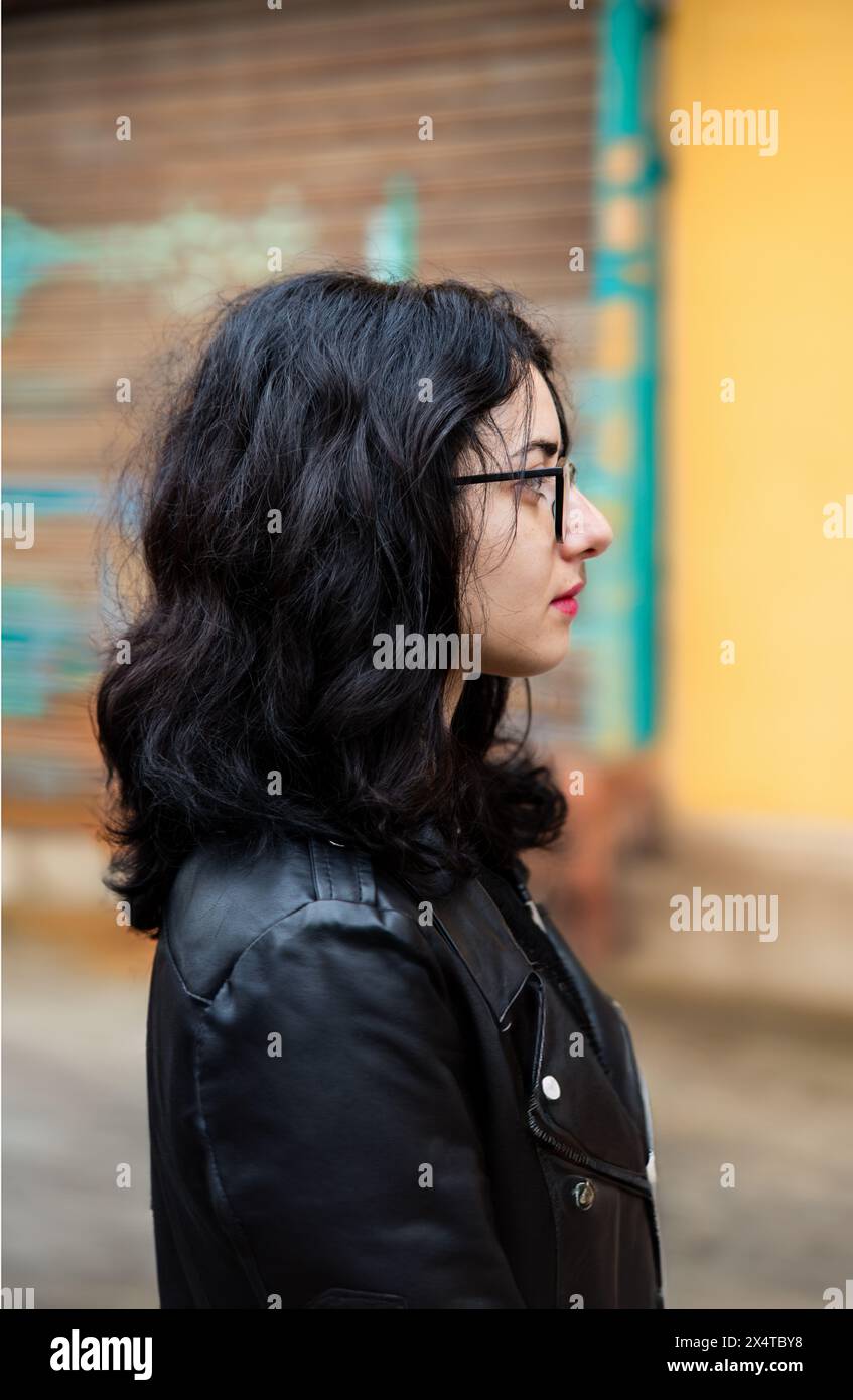 Profile of focused young woman looking Stock Photo - Alamy