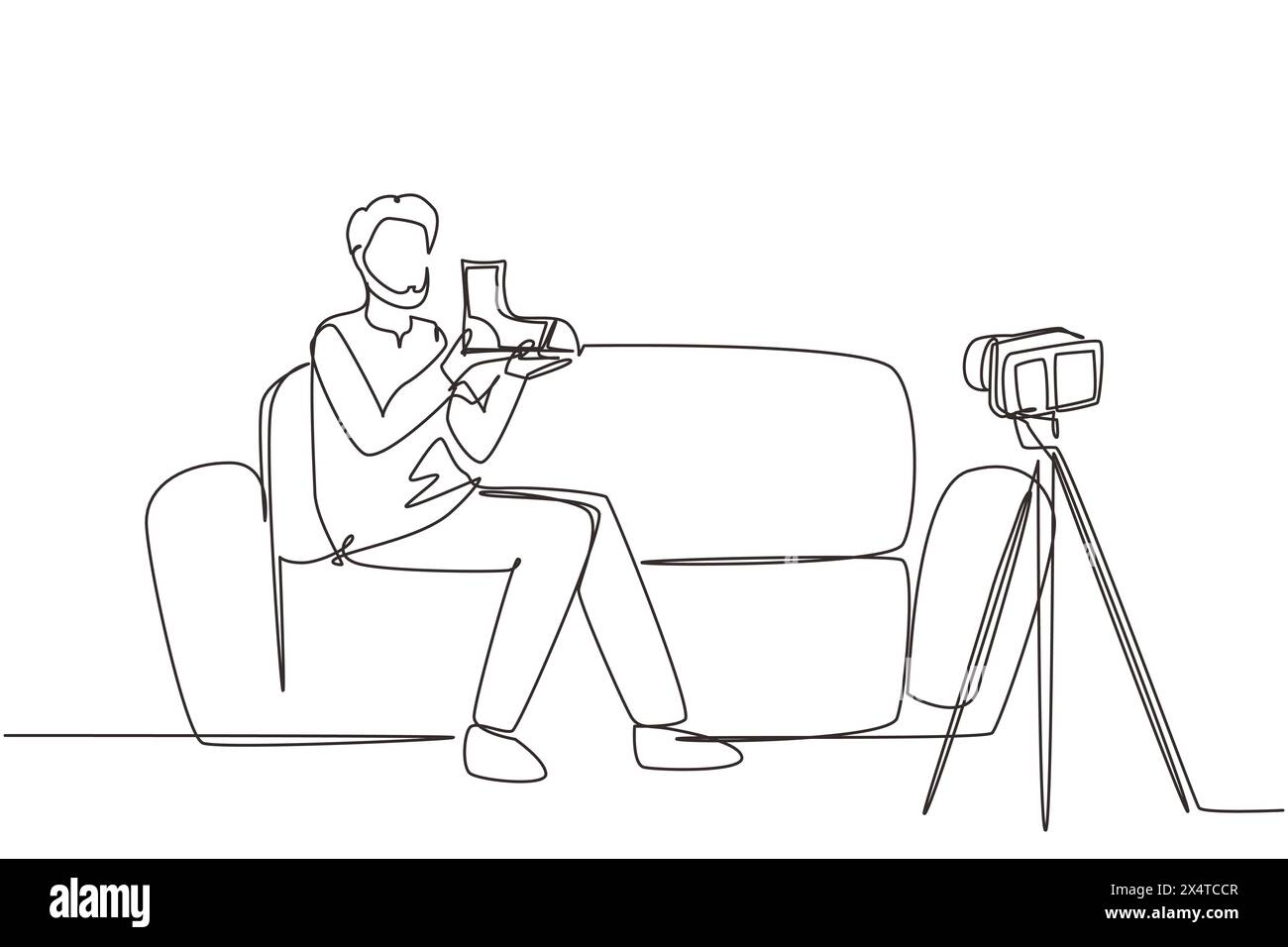 Single Continuous Line Drawing Social Media Influencer Reviewing Boots Smiling Young Arab Man