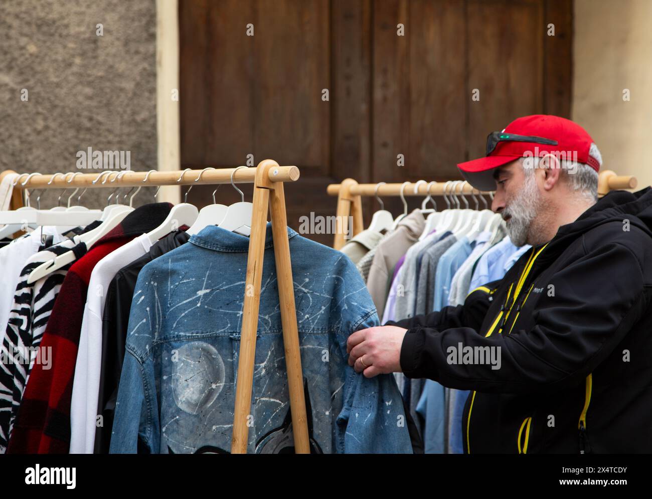 Selecting garments hi-res stock photography and images - Alamy