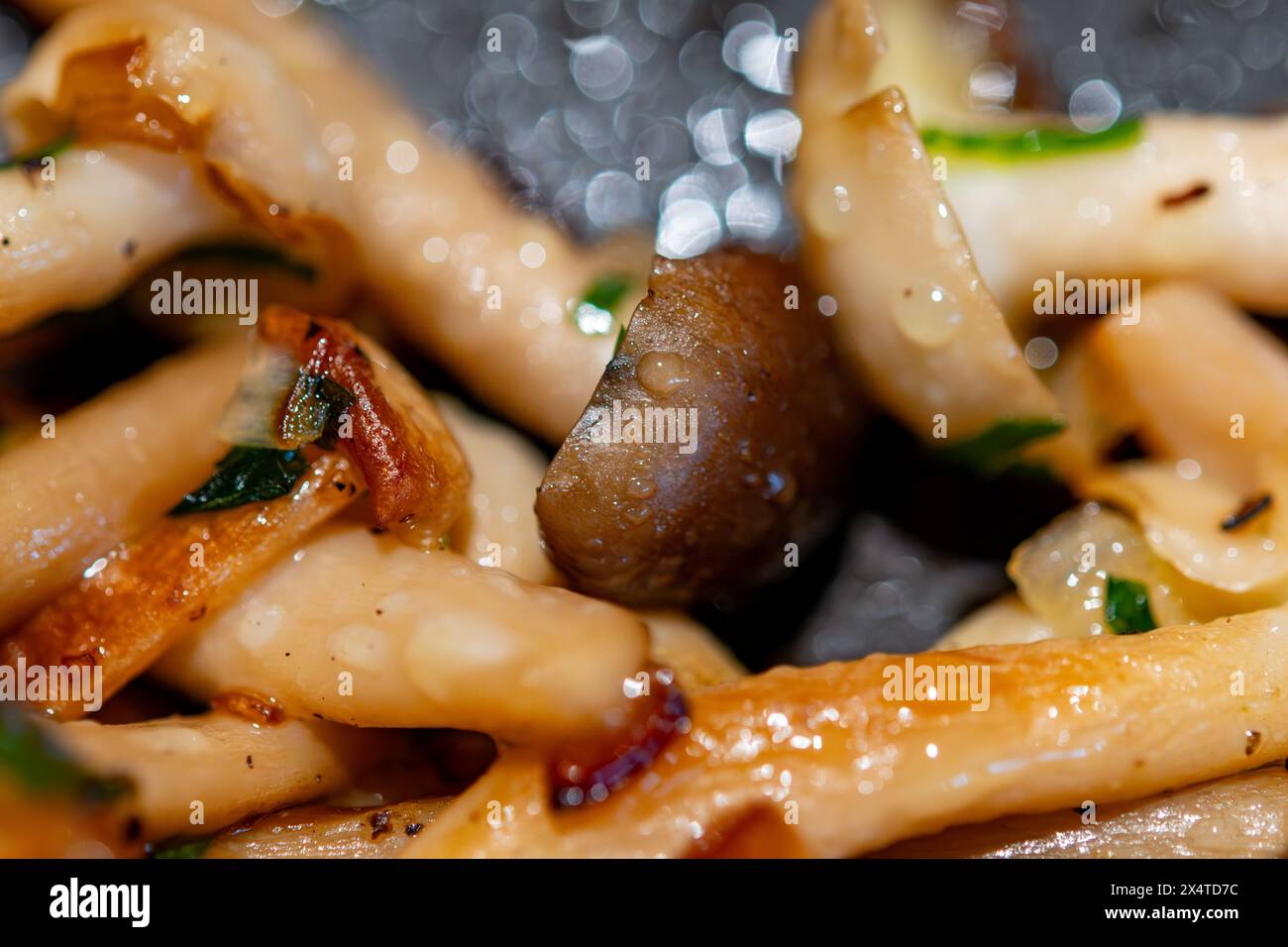 Roasted with onion white and brown shimeji edible mushrooms native to ...