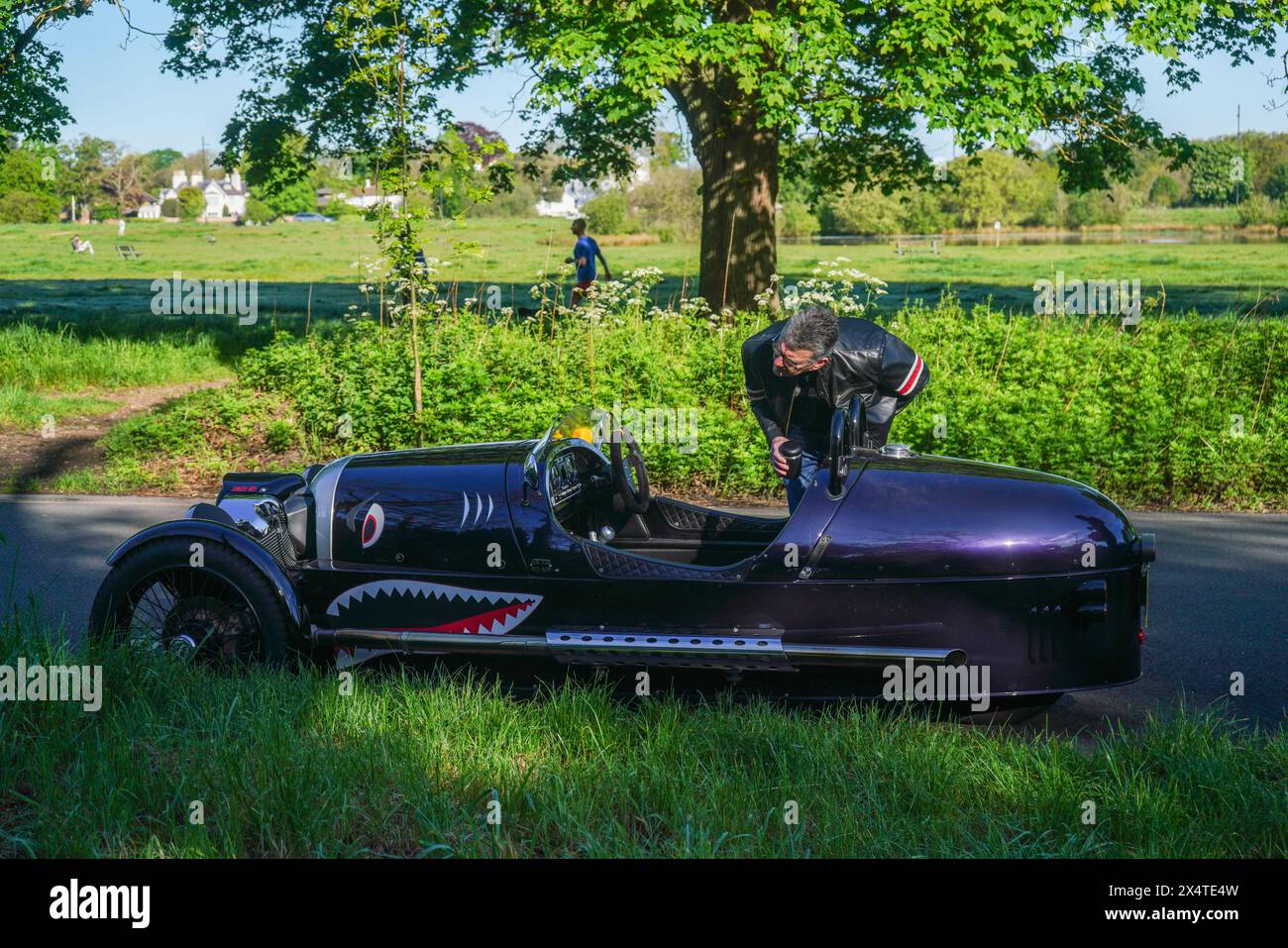 Wimbledon, London, UK. 5 May, 2024. A man looks the interor of a Morgan ...