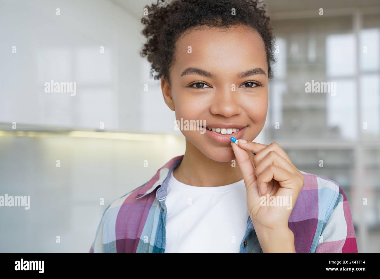 Smiling person brushing teeth, promoting dental hygiene and self-care ...