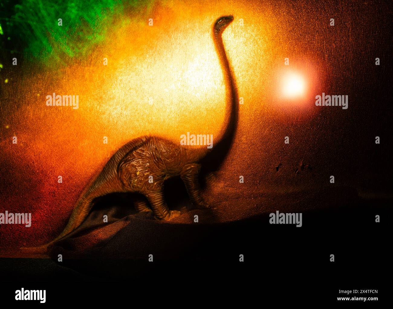 Dinosaurs among lights. Light painting in the dark. Dinosaur ...