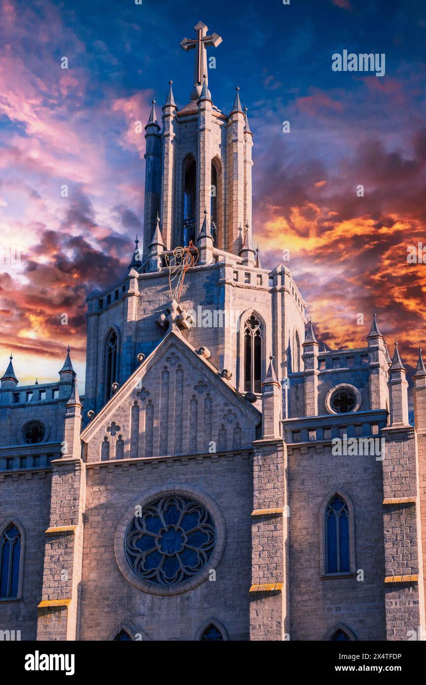 tower and spire of the gothic old ancient Catholic Cathedral on ...