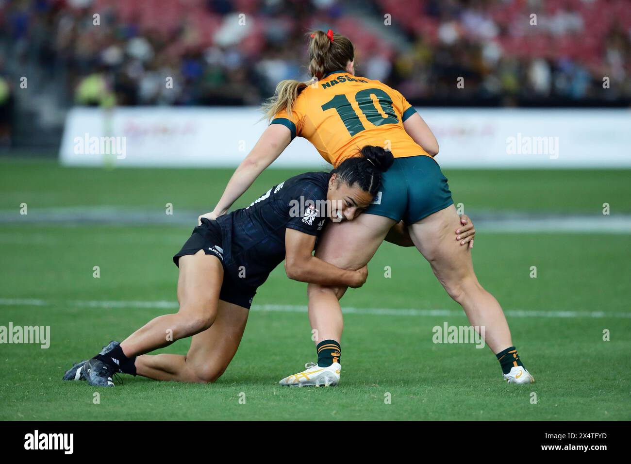 Risi Pouri-Lane of New Zealand tackles Isabella Nasser of Australia ...