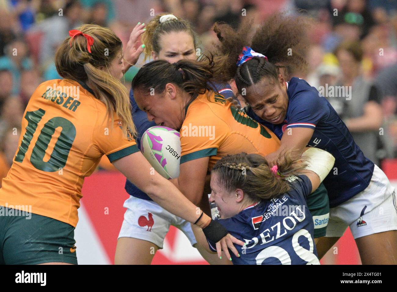 Singapore. 5th May, 2024. Australia's Tia Hings (C) fights for the ball ...