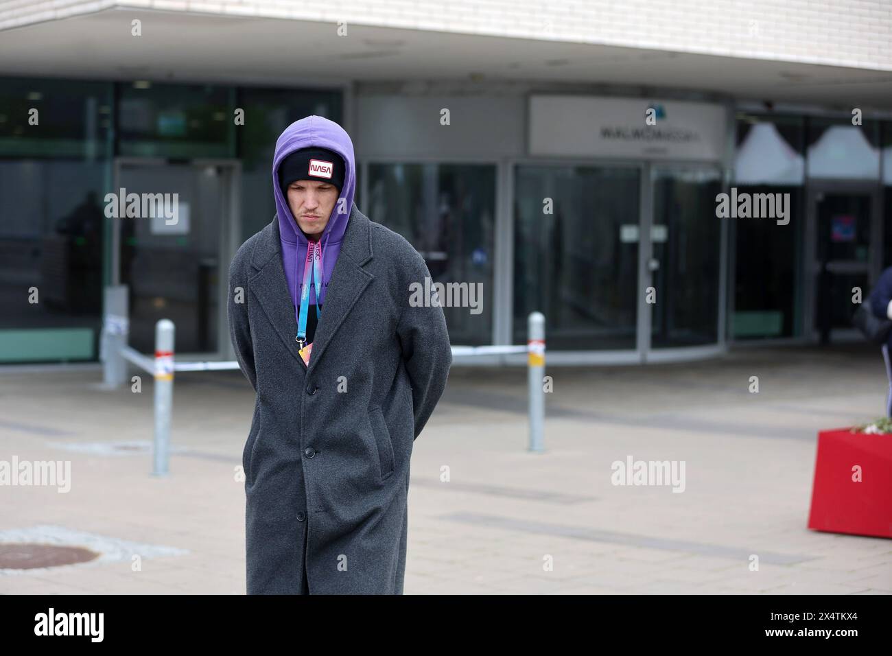 Artist Marko Purisic also known as Baby Lasagna is seen in fromt of ...