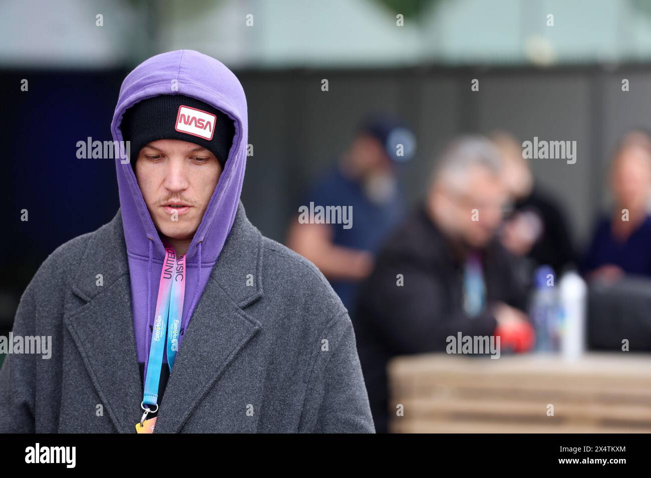 Artist Marko Purisic also known as Baby Lasagna is seen in fromt of ...