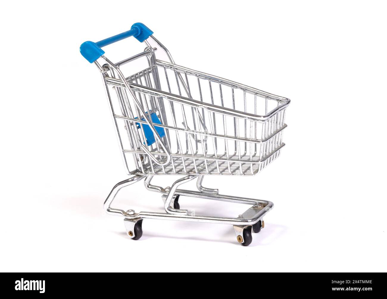 Small shopping cart isolated on a solid background Stock Photo - Alamy