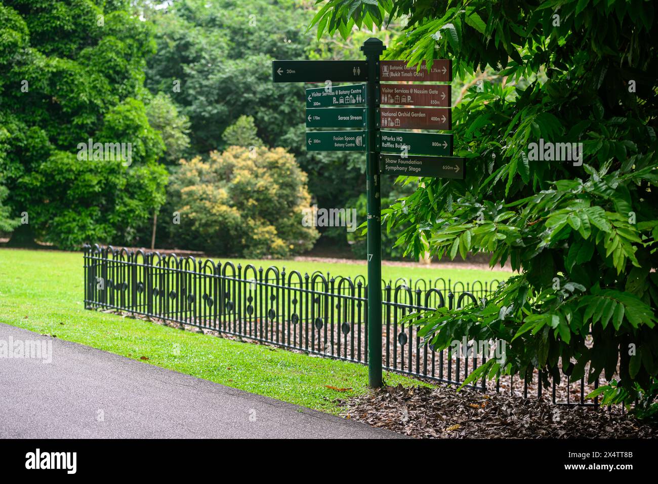 A direction sign in Singapore Botanic Gardens, Singapore Stock Photo ...