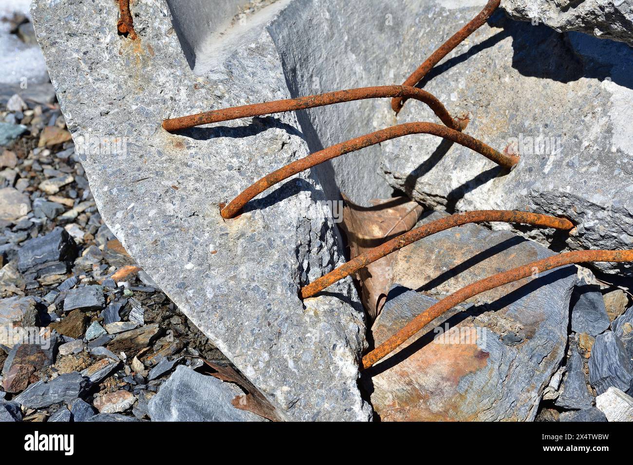 Rusted rebars into broken concrete pipe Stock Photo - Alamy