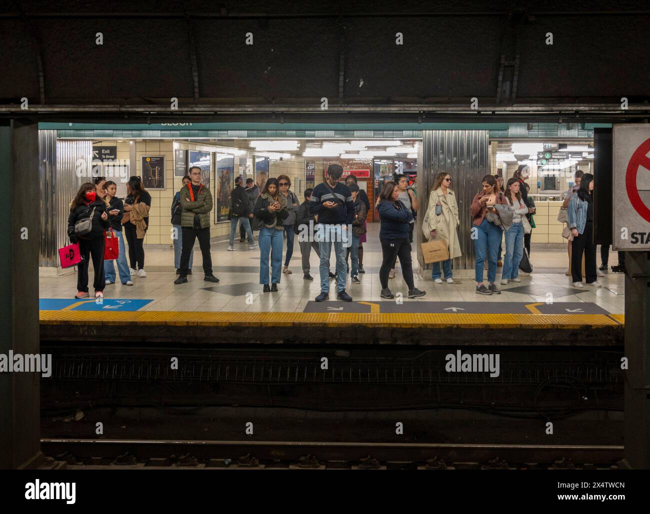 passengers waiting for subway train, Spadina Station, Toronto, Canada ...