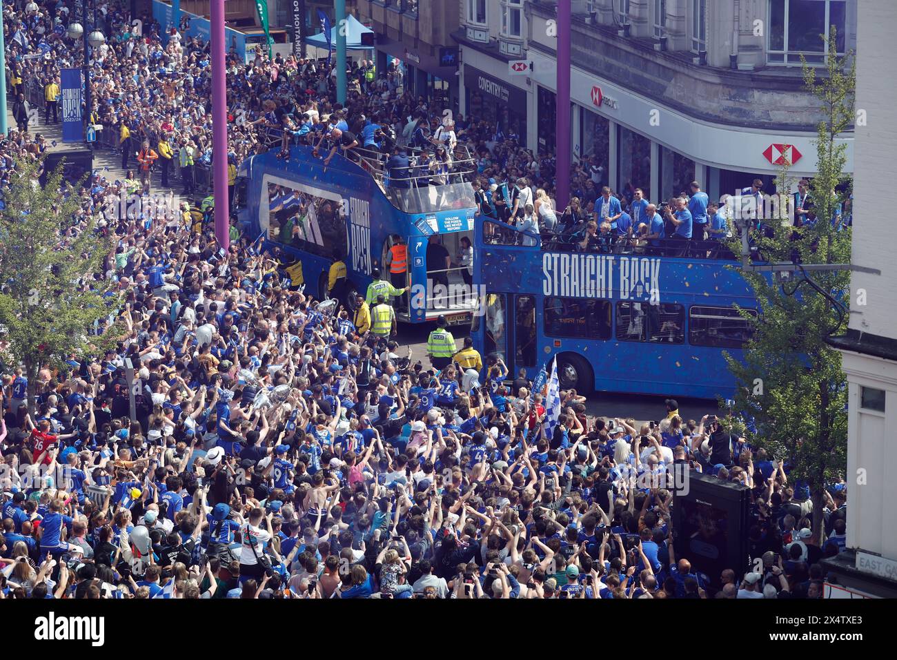 Leicester City players and pass the crowds gathered at Gallowtree Gate ...