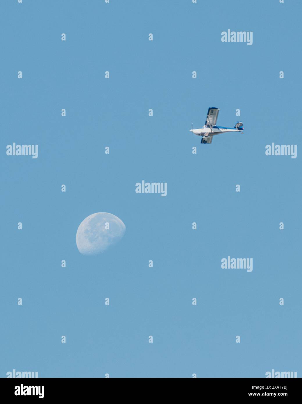 Plane flies in sky against hi-res stock photography and images - Alamy