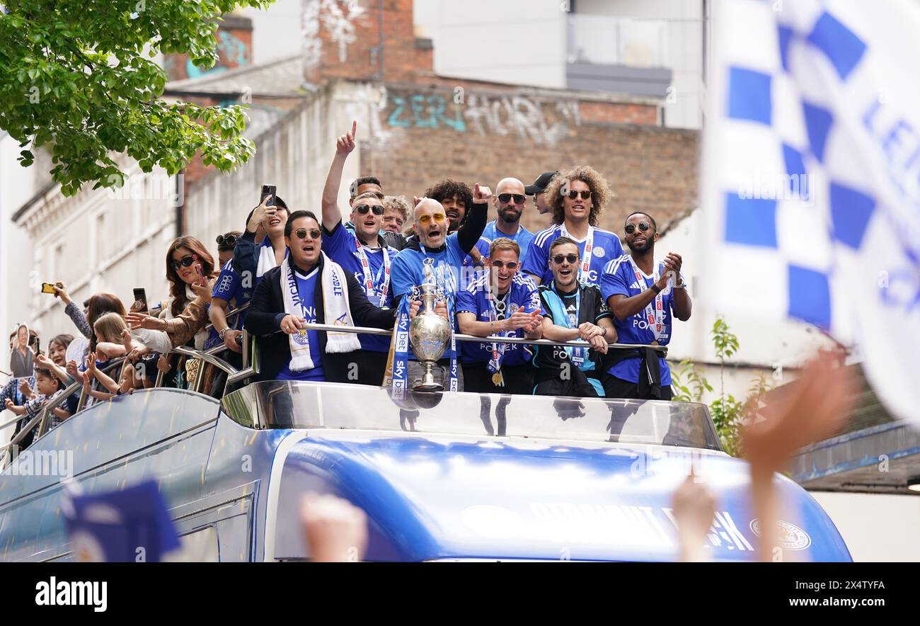 Leicester City players and staff during an open-top bus parade in ...
