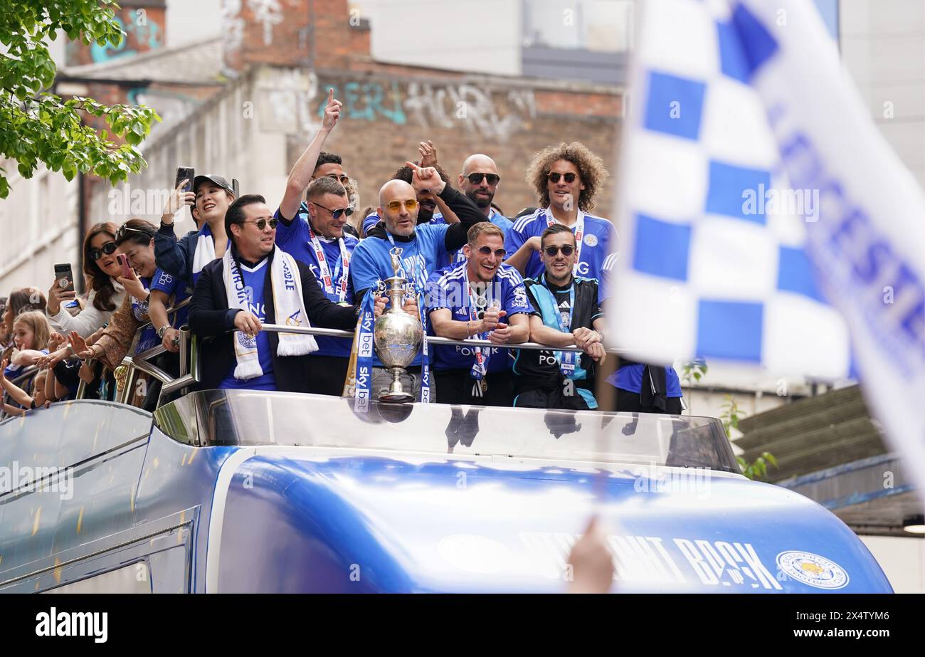 Leicester City players and staff during an open-top bus parade in ...