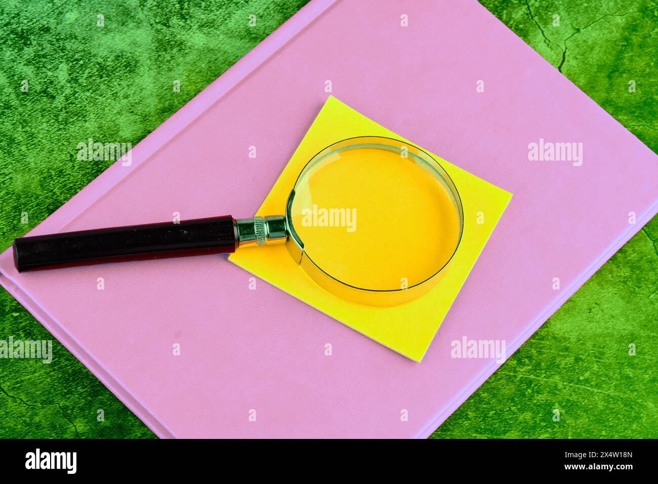 Photo of notebooks, magnifying glass, sticker with copy space, top view ...